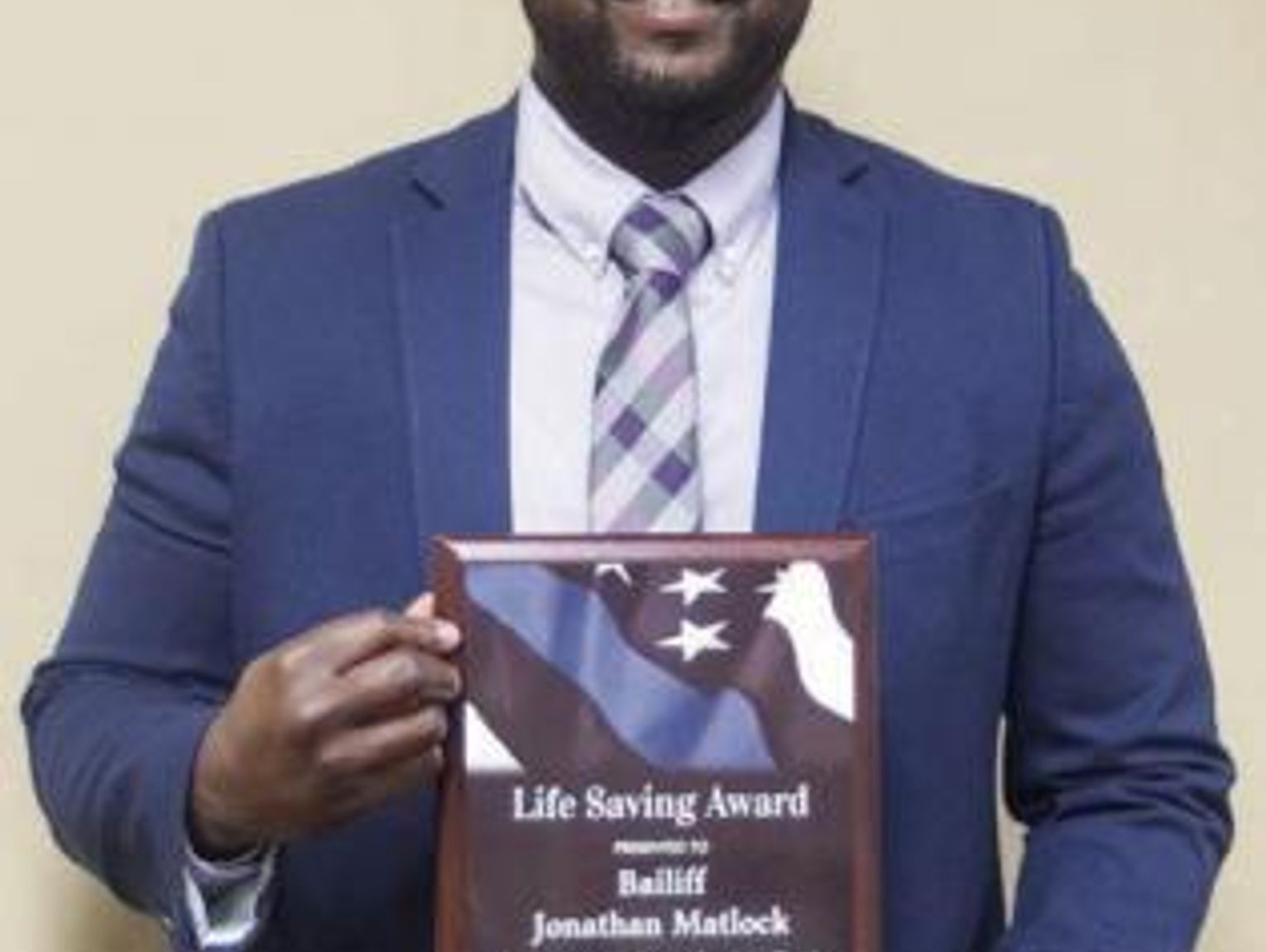 Courthouse bailiff honored for life saving act